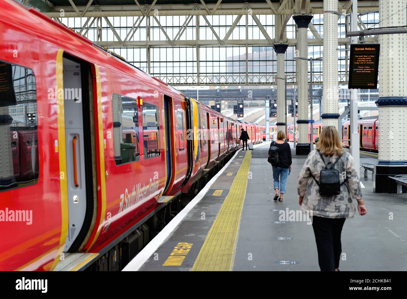 Commuter on train platform hi-res stock photography and images - Alamy