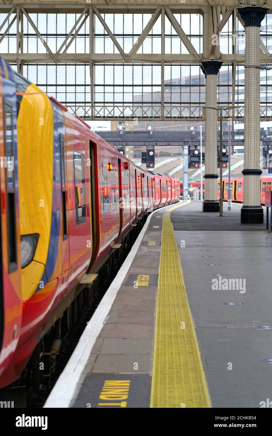 Commuter on train platform hi-res stock photography and images - Alamy