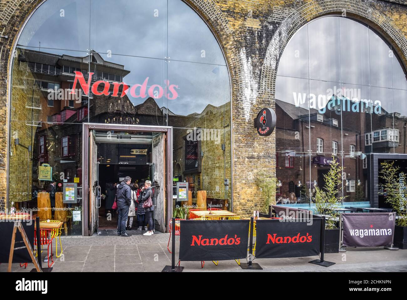 Exterior of Nando’s restaurant in West Hampstead, London, UK. The chain ...