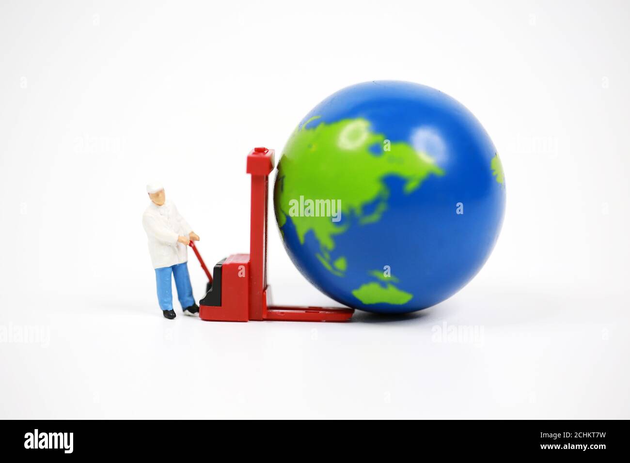 Worker lifting earth hi-res stock photography and images - Alamy