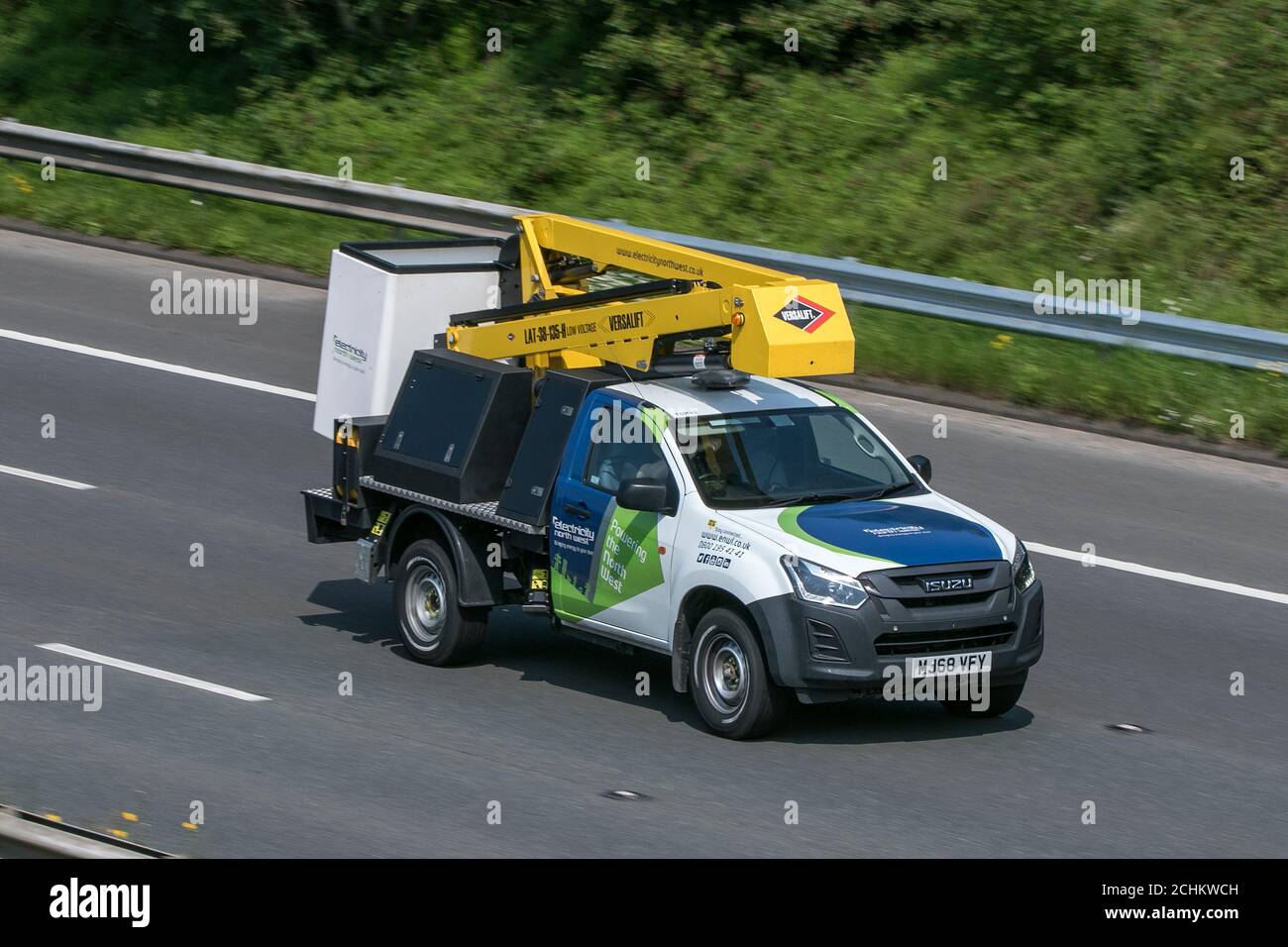 An Electricity north-west Isuzu vehicle driving on the M6 motorway ...