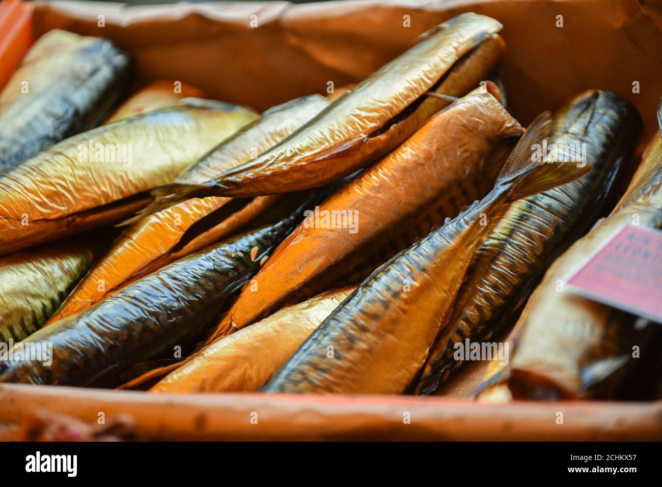 Smoked fish on the street market. Close-up Stock Photo - Alamy