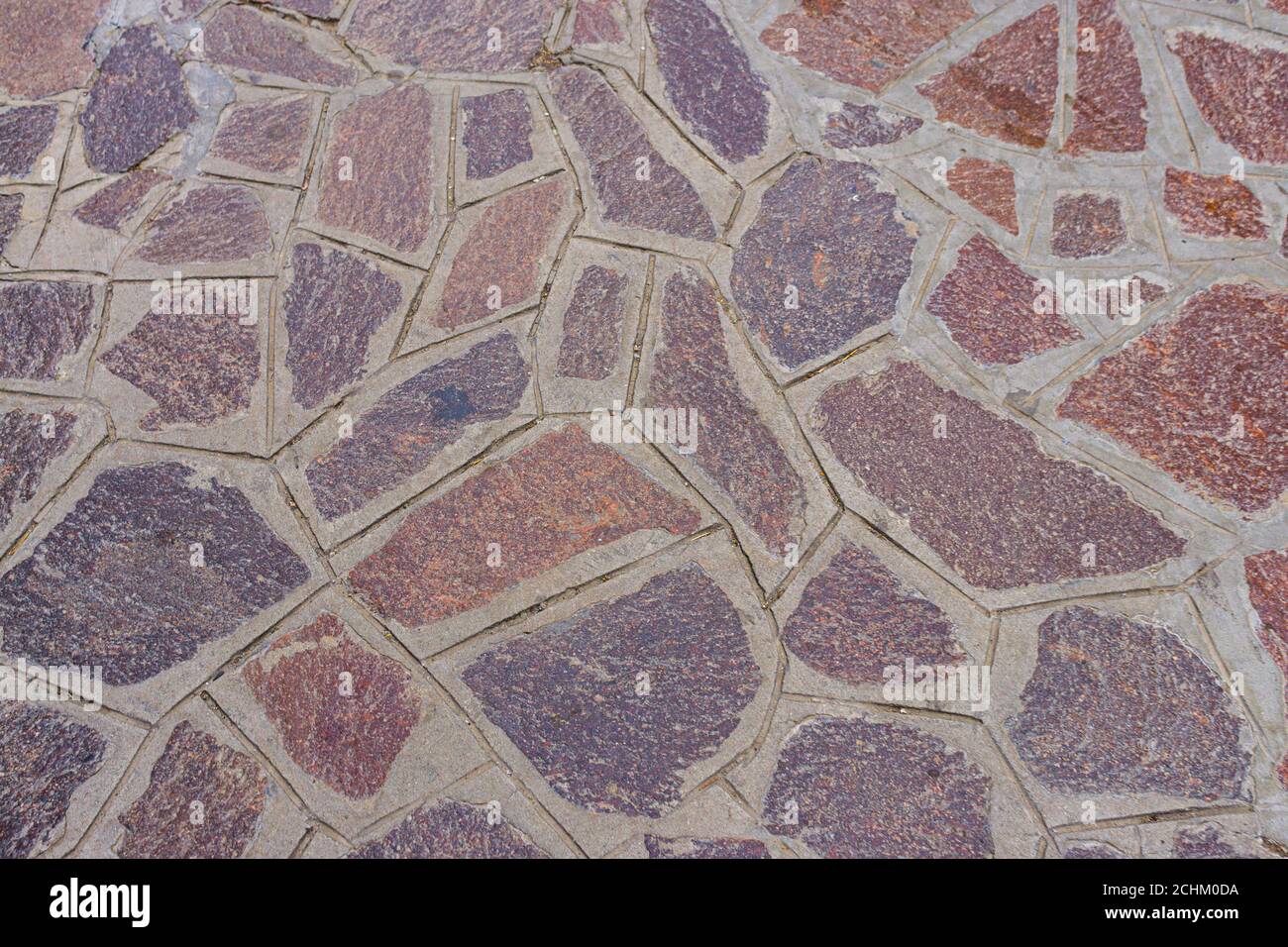 Sidewalk with colourful paved ground Stock Photo - Alamy