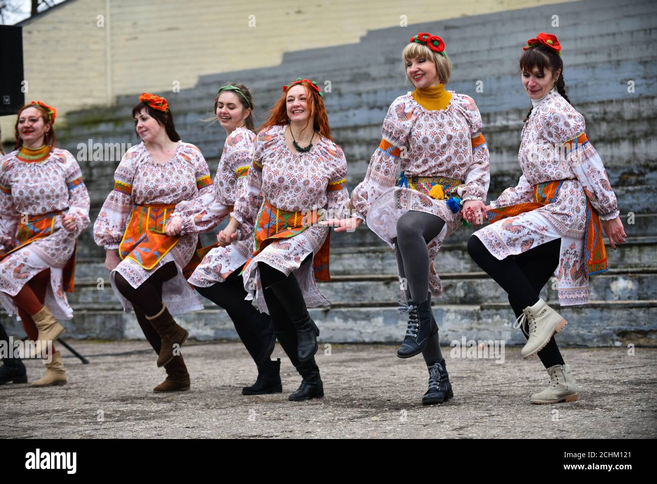 Russian ethnic carnival Maslenitsa - Pancake week, people dance and ...