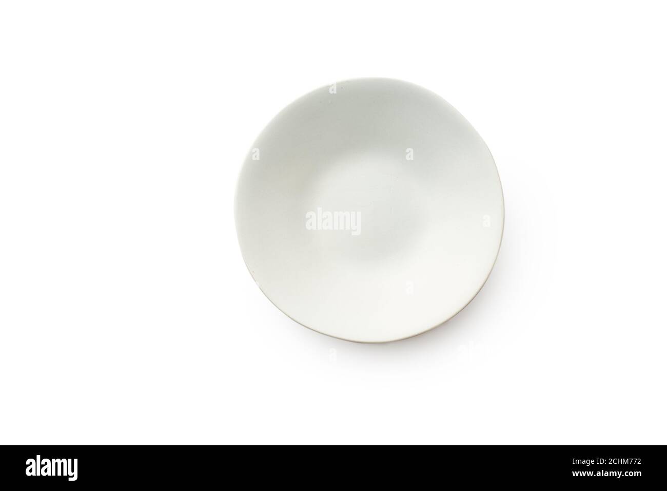 Flat lay with modern design matt empty plate isolated on white ...