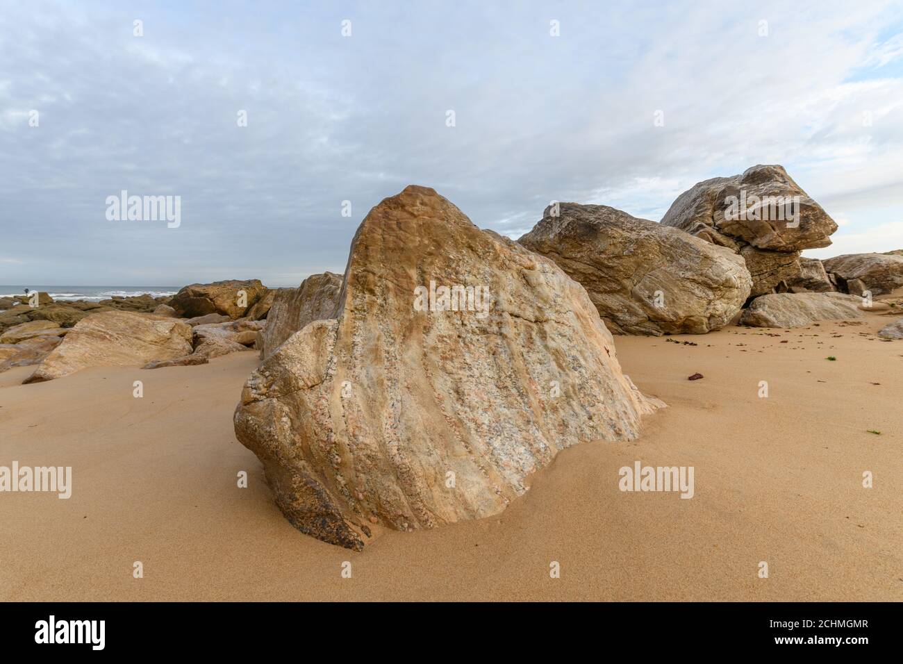 Sand beach among rocks in a summer morning in France Stock Photo - Alamy