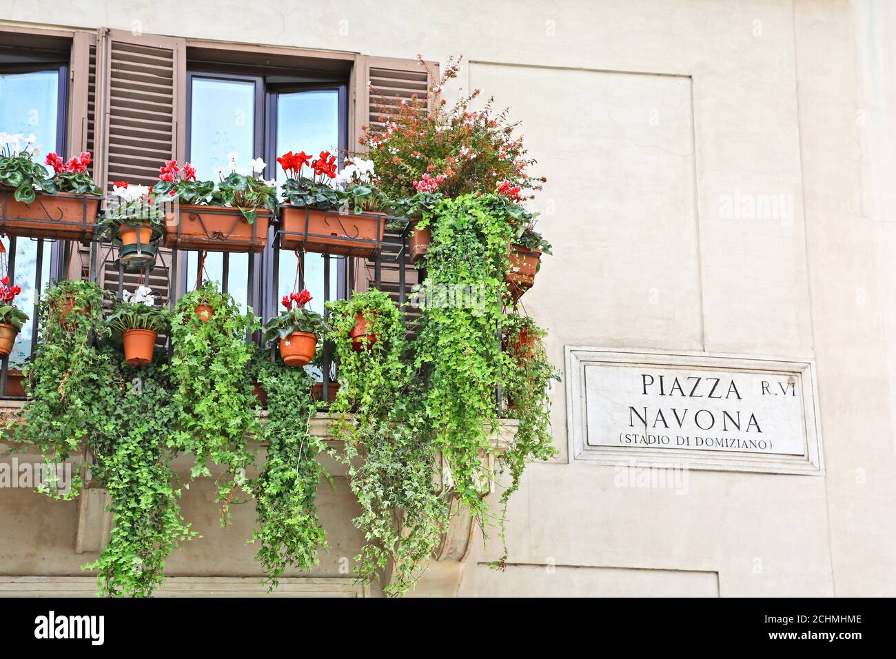 Balcony with flower pots in Piazza Navona, Rome Stock Photo - Alamy