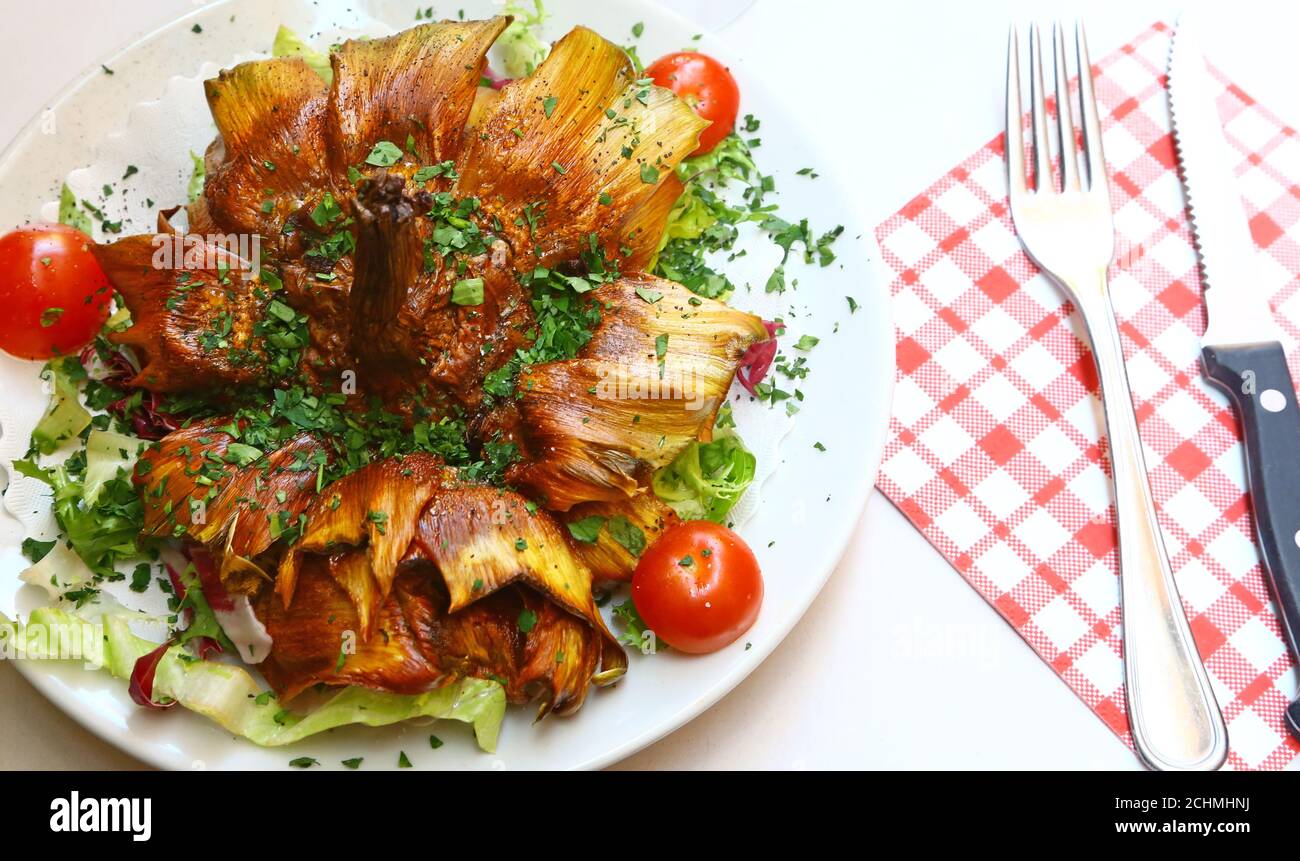 Carciofi alla giuda, literally Jewish-style artichokes, is among the ...