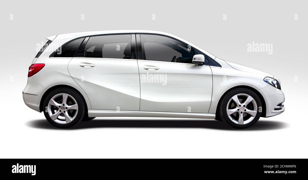 German compact car side view isolated on white Stock Photo - Alamy