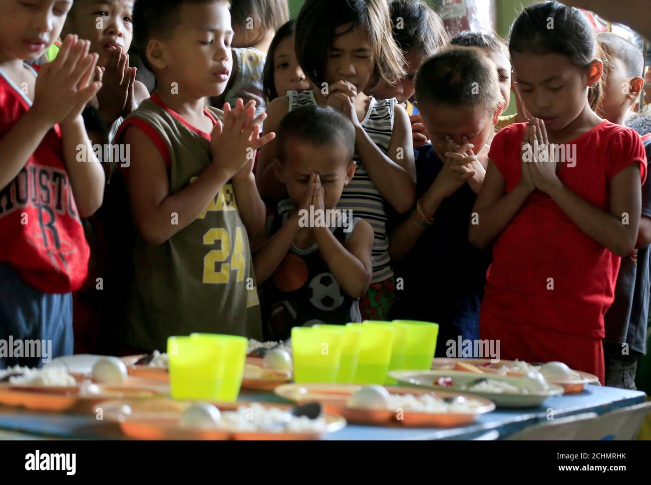 Children pray before meals hi-res stock photography and images - Alamy
