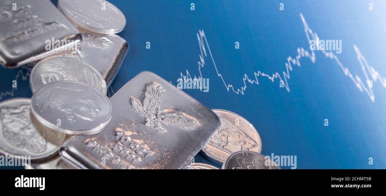 Silver bars and coins with price chart and light shining. Bright future ...
