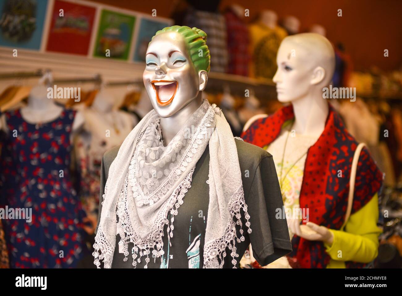 Two female antipode mannequins: one cheerful happy, another sad, angry ...