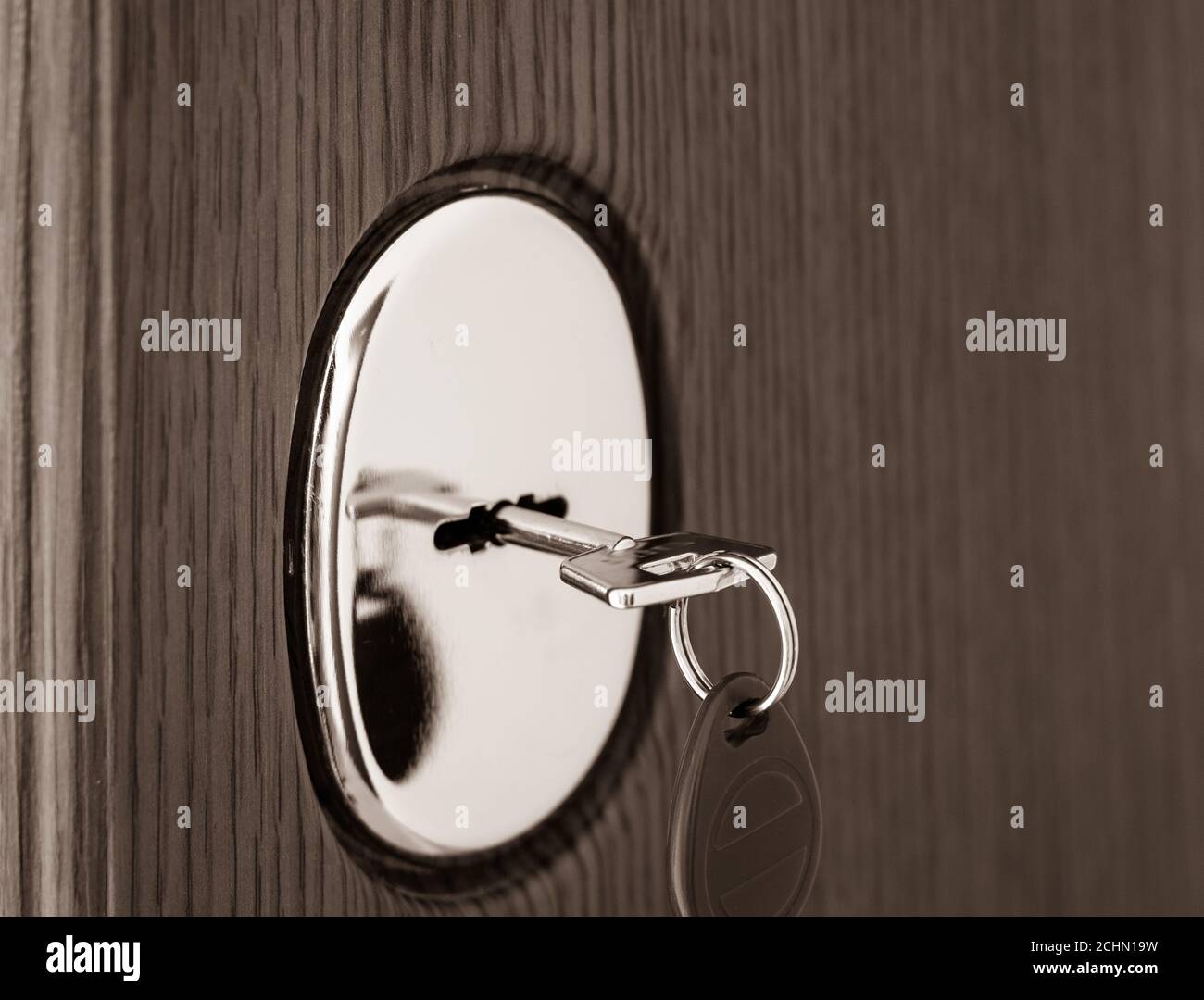 door with key in keyhole Stock Photo - Alamy