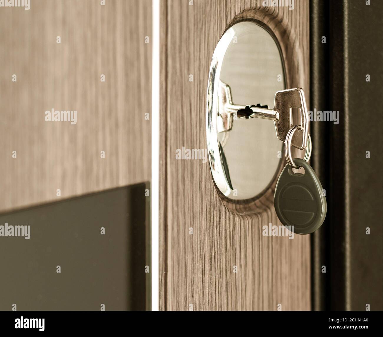 door with key in keyhole Stock Photo - Alamy