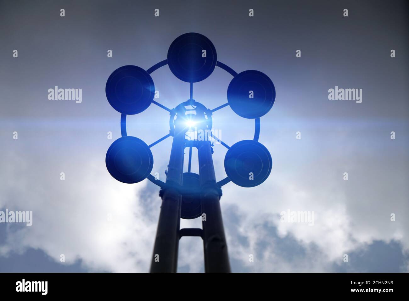 Low angle shot of a tower with six circles around a ring Stock Photo ...