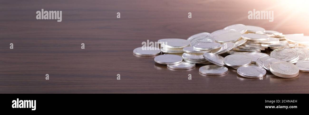 Shining coins hi-res stock photography and images - Alamy