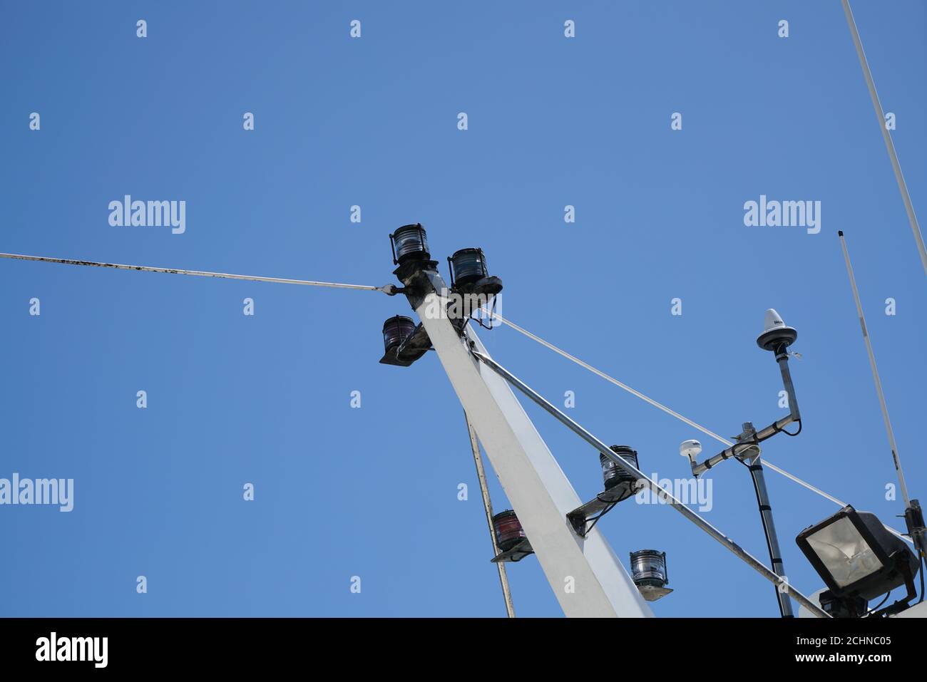 Low angle shot of position lights on the mast of a ship Stock Photo - Alamy