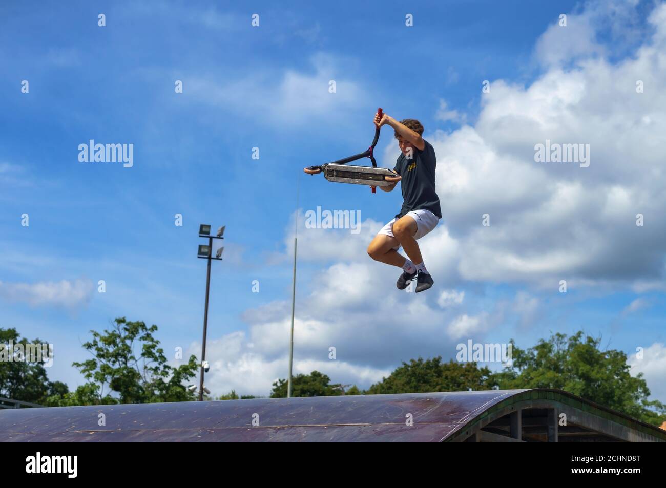 stunt scooters, young people in a skate Park, scooter sport, freestyle ...