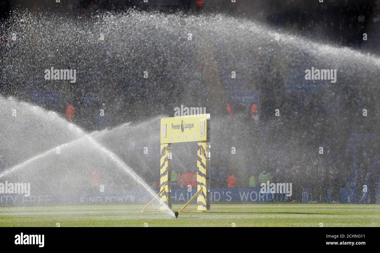 Sprinklers water pitch before match hi-res stock photography and images ...