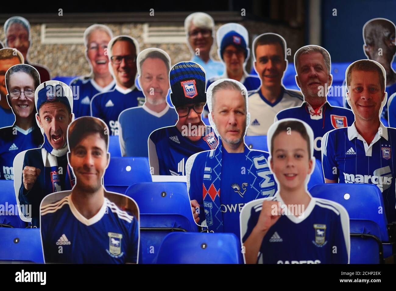 Cardboard cutout fan boards are seen in the Cobbold Stand Lower ...