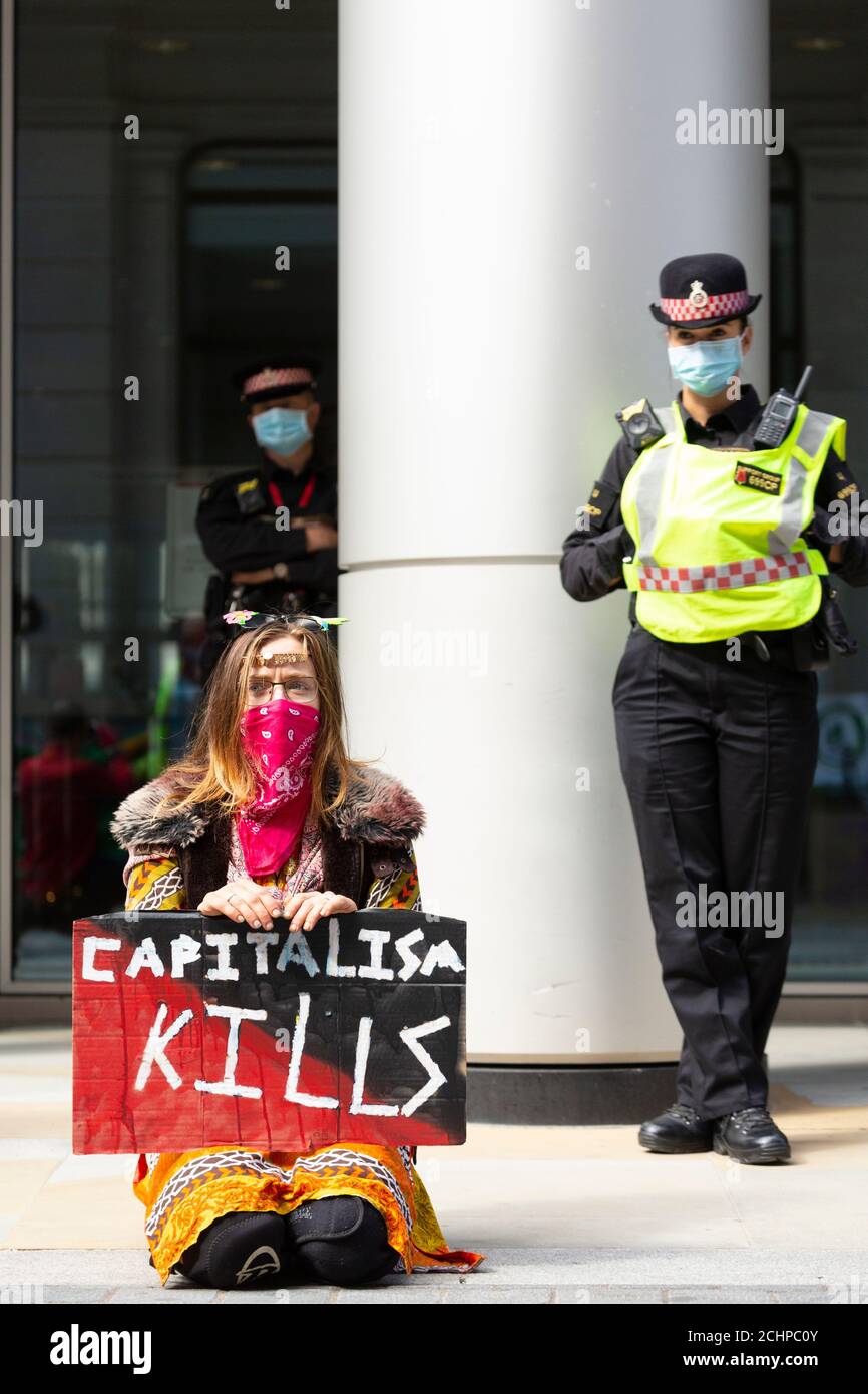 Protester holding placard during Earth Strike demonstration outside the ...