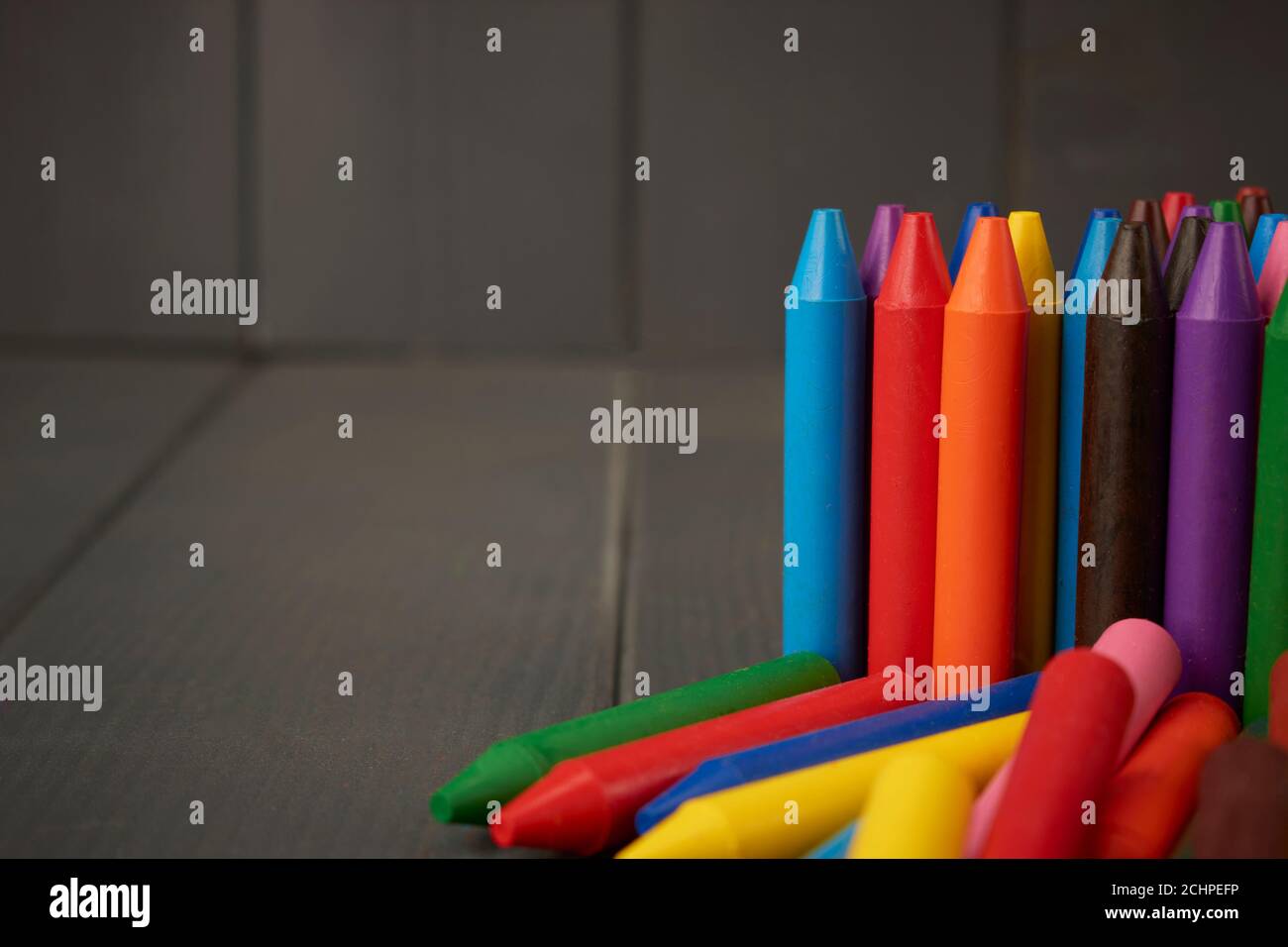 Colored crayons that children use at school at the most basic levels ...