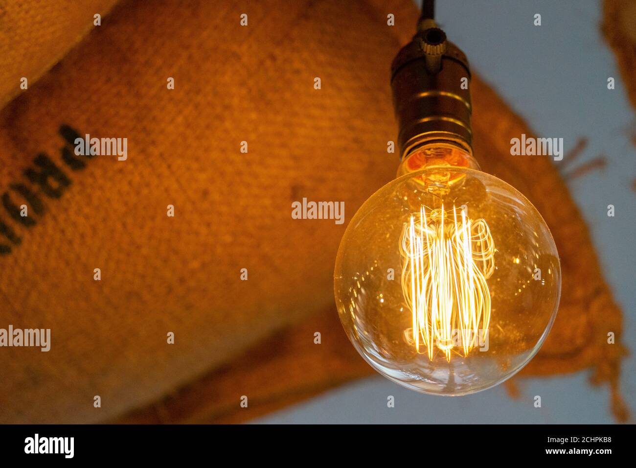 Hanging Light Bulb Background - hanging incandescent light bulb and ...