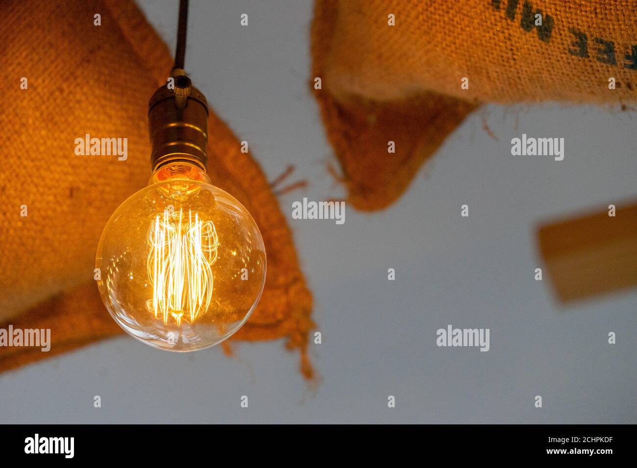 Hanging Light Bulb Background - hanging incandescent light bulb and ...