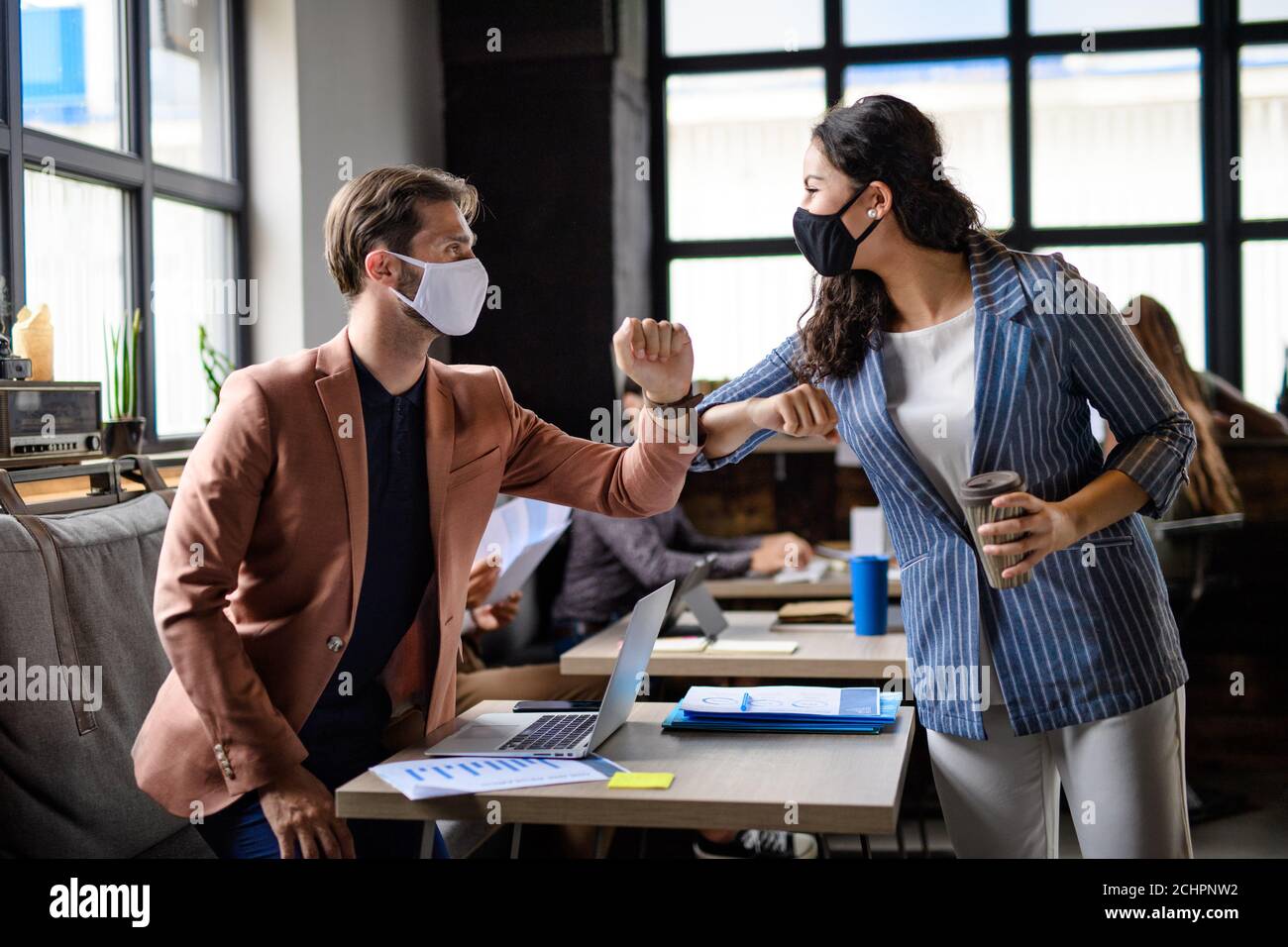 Business people greeting in office hi-res stock photography and images ...
