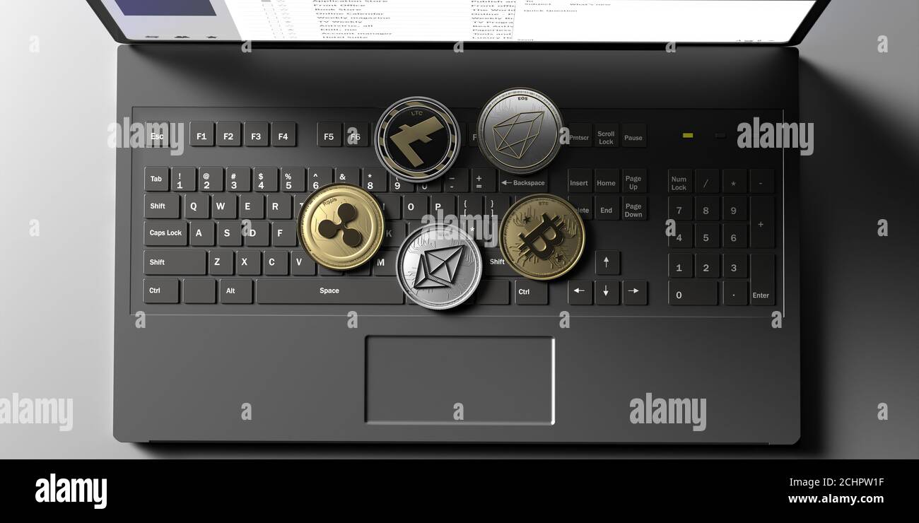 Cryptocurrency coins set on computer laptop background. Bitcoin, ripple, litecoin, eos, ethereum ...
