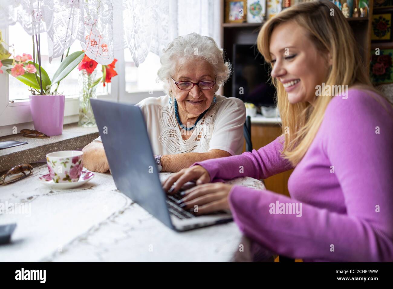 Grandmother nursing grandchild hi-res stock photography and images - Alamy
