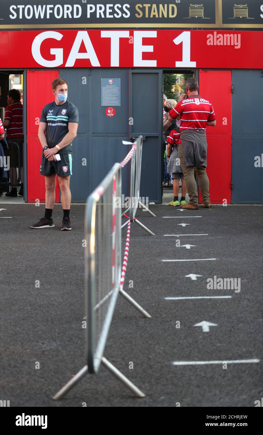 Spectators enter the ground via social distance markings before the ...