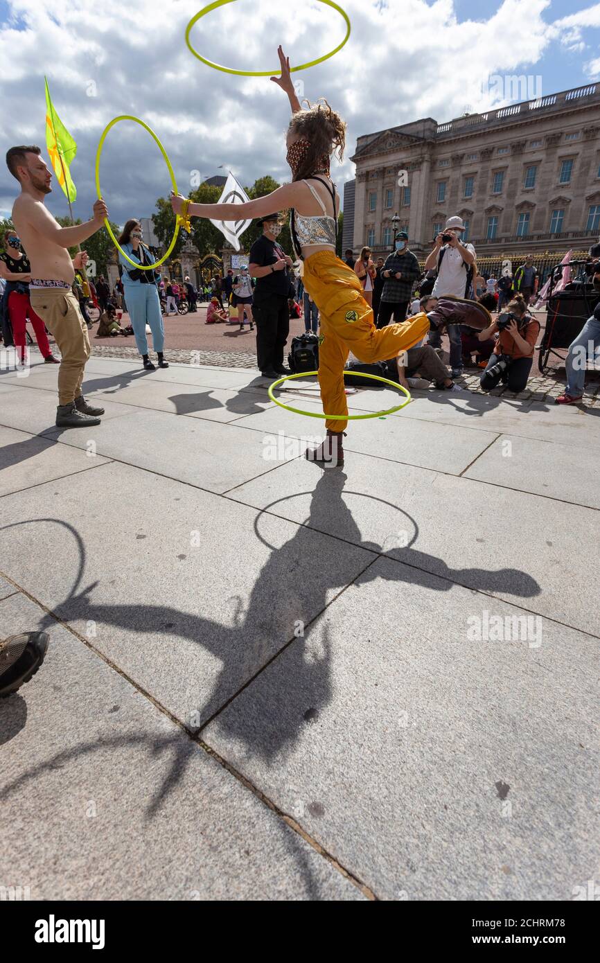 A hula hoop dancer during a 'Discobedience' Extinction Rebellion ...