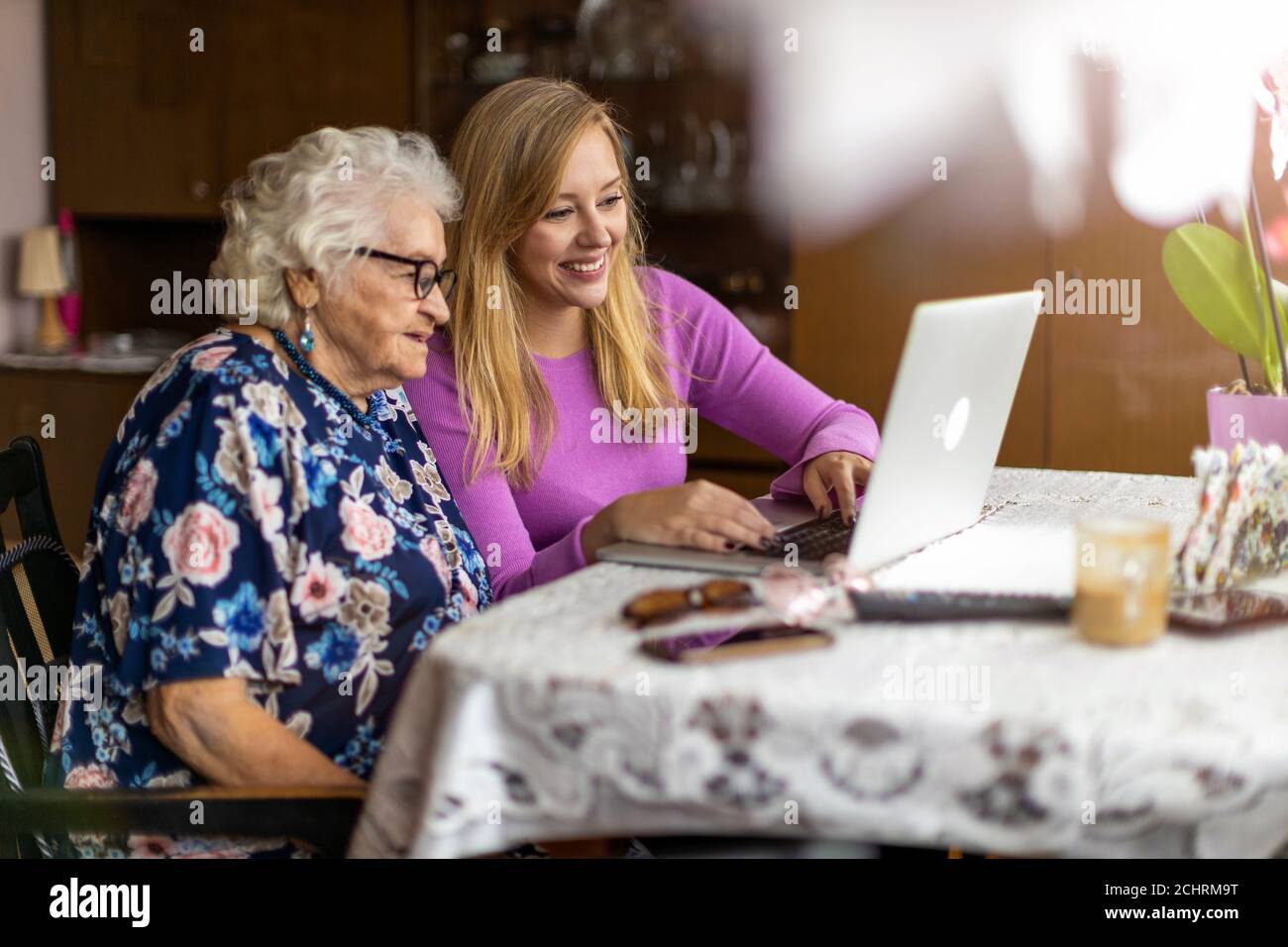 Grandmother nursing grandchild hi-res stock photography and images - Alamy