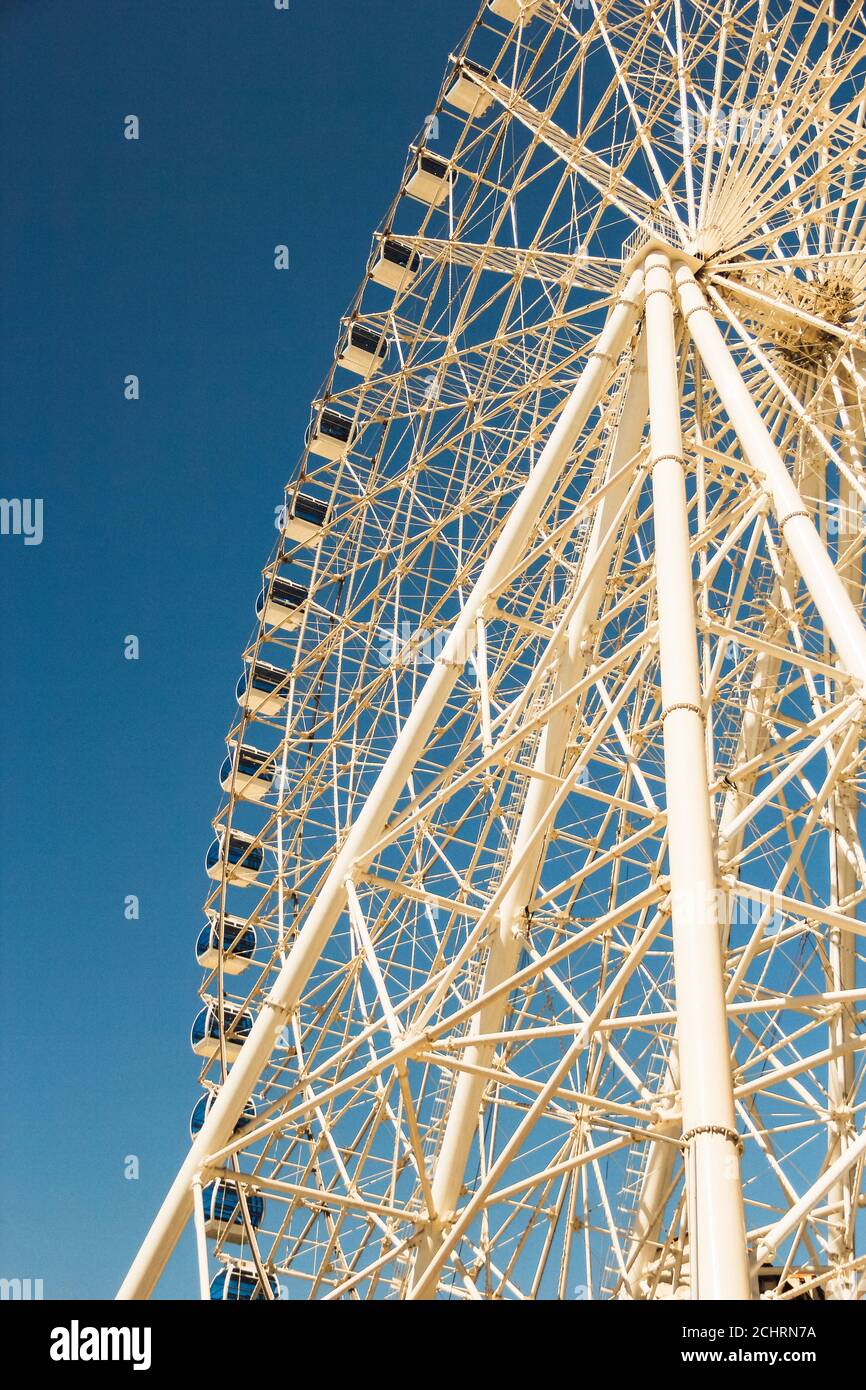 Vertical low angle shot of a Ferris wheel during the daytime Stock ...