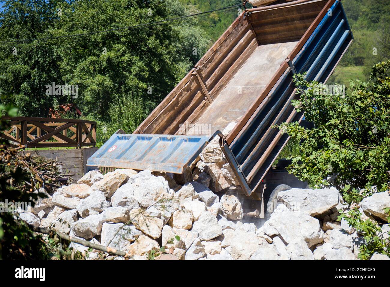 Cargo truck, tipper, unloading construction material, masonry stone ...