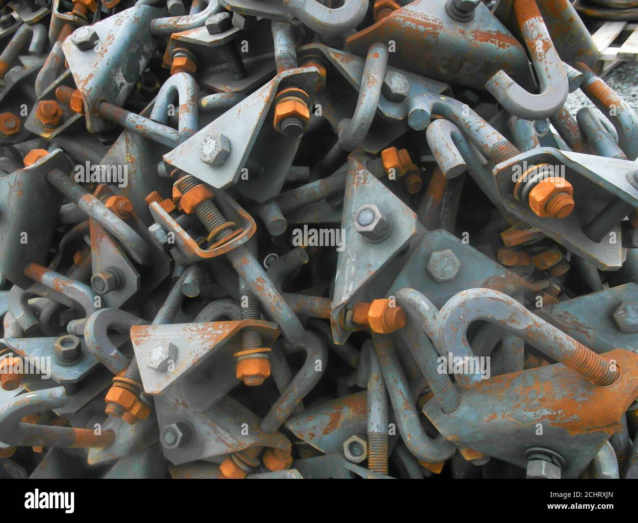 a bunch of rusty identical little rusty details Stock Photo - Alamy