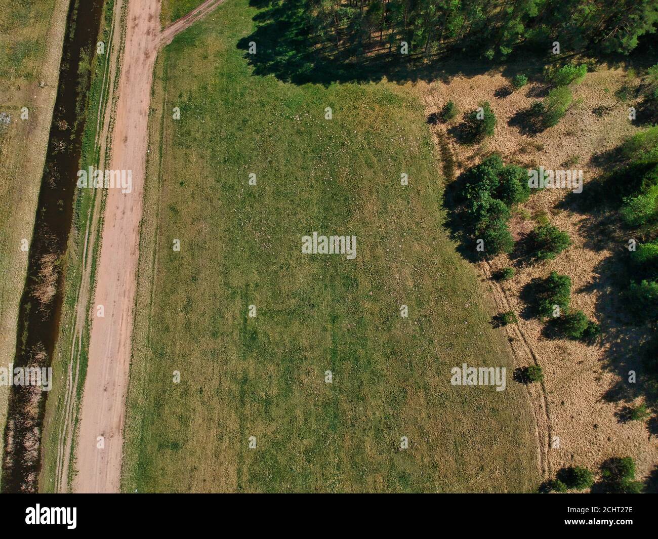 High angle shot of grassland and trees Stock Photo - Alamy