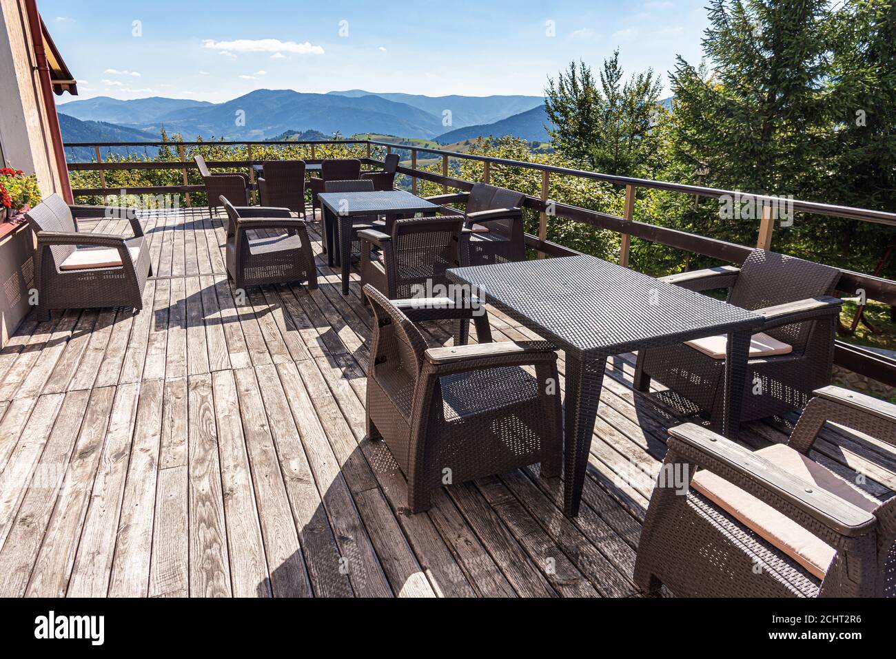 Terrace with tables and chairs with beautiful mountain views. Cafe ...