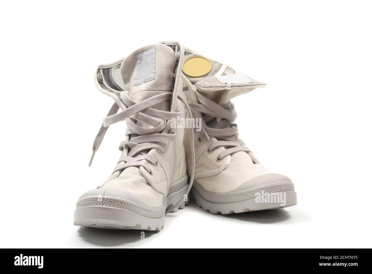 Canvas boots, isolated over white background Stock Photo - Alamy