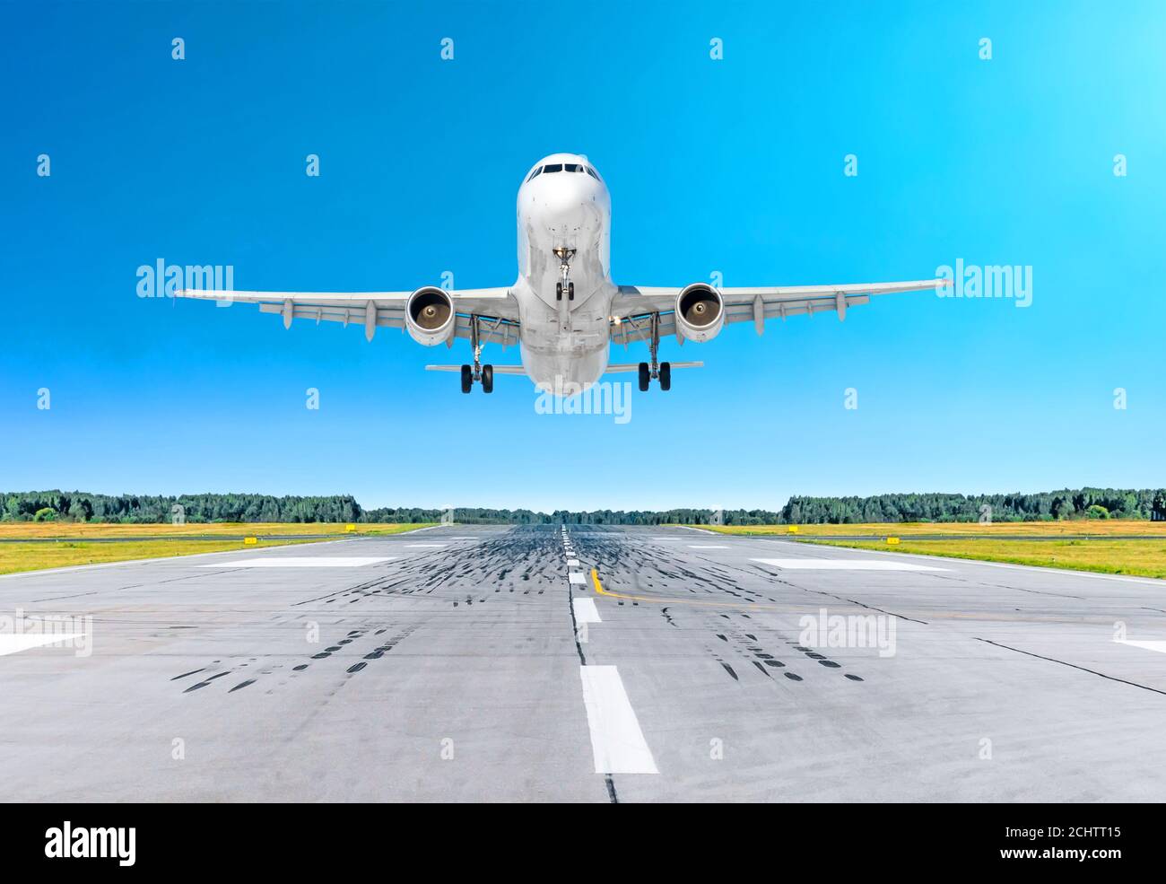 Airplane aircraft flying departure after flight, landing on a runway in ...