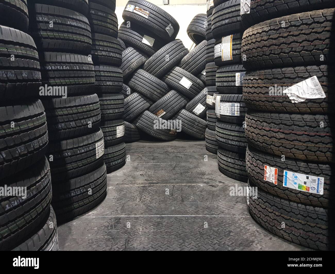Car tyre warehouse Stock Photo - Alamy