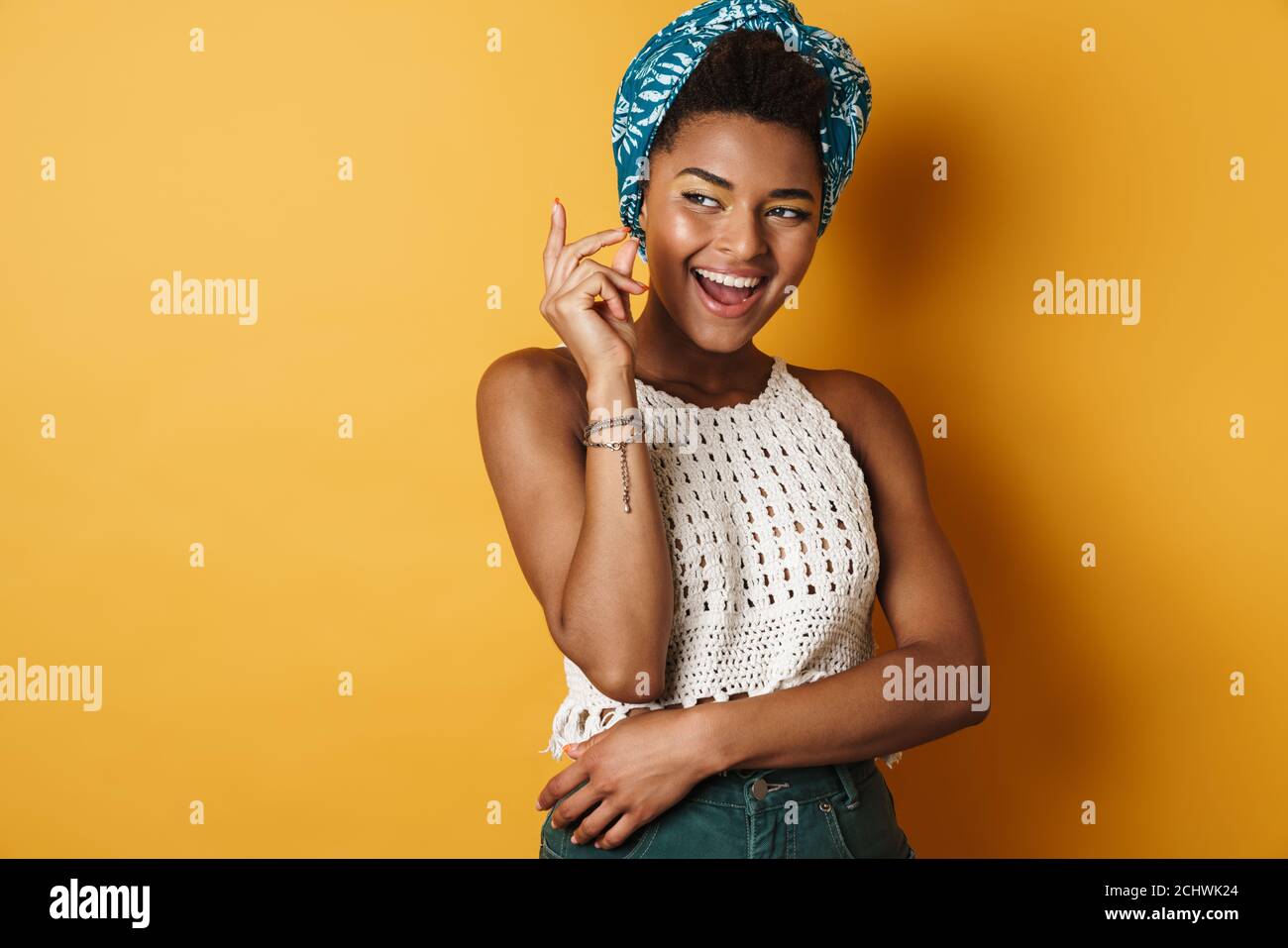 Image of funny african american woman snapping her fingers and laughing ...
