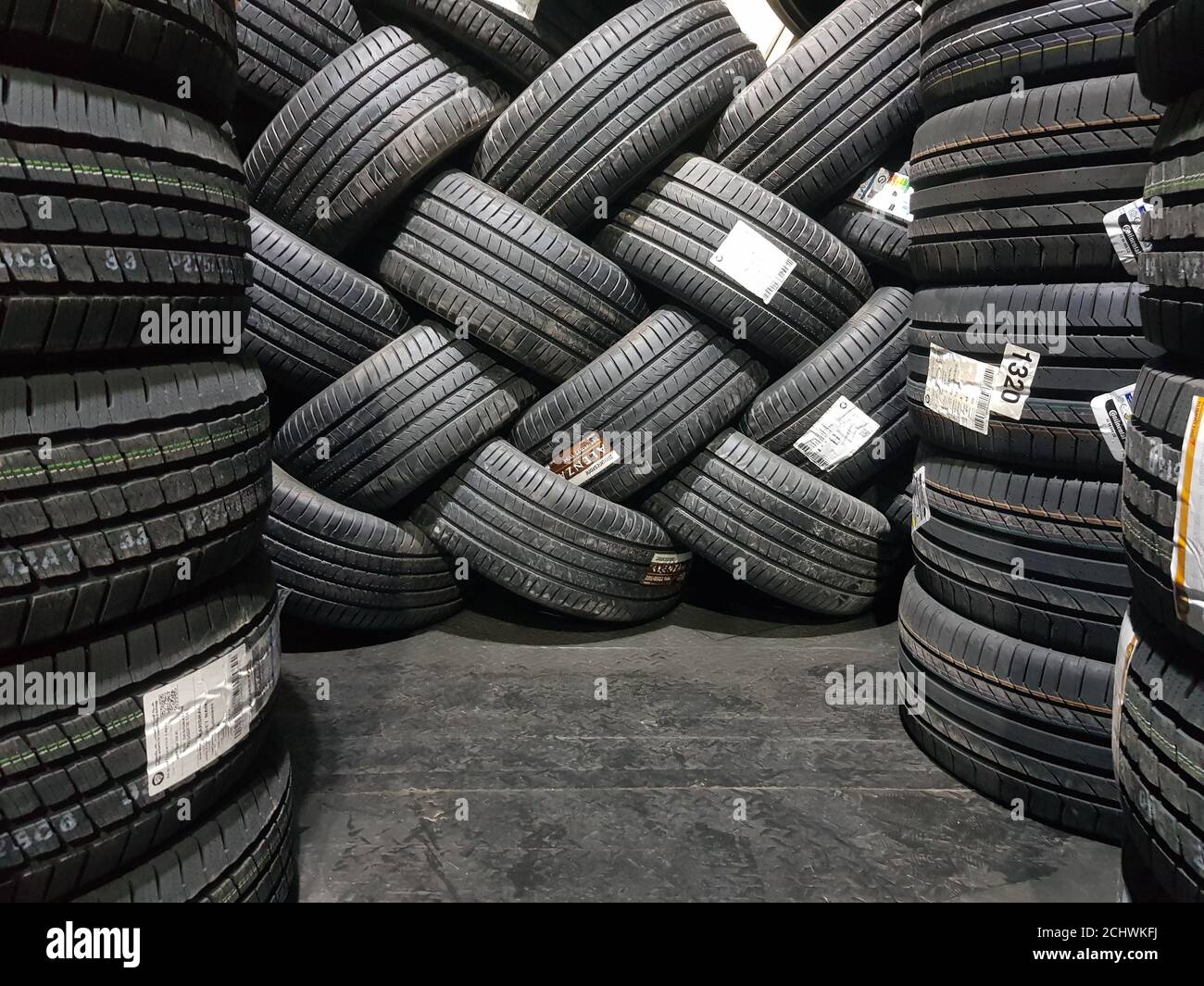 Car tyre warehouse Stock Photo - Alamy