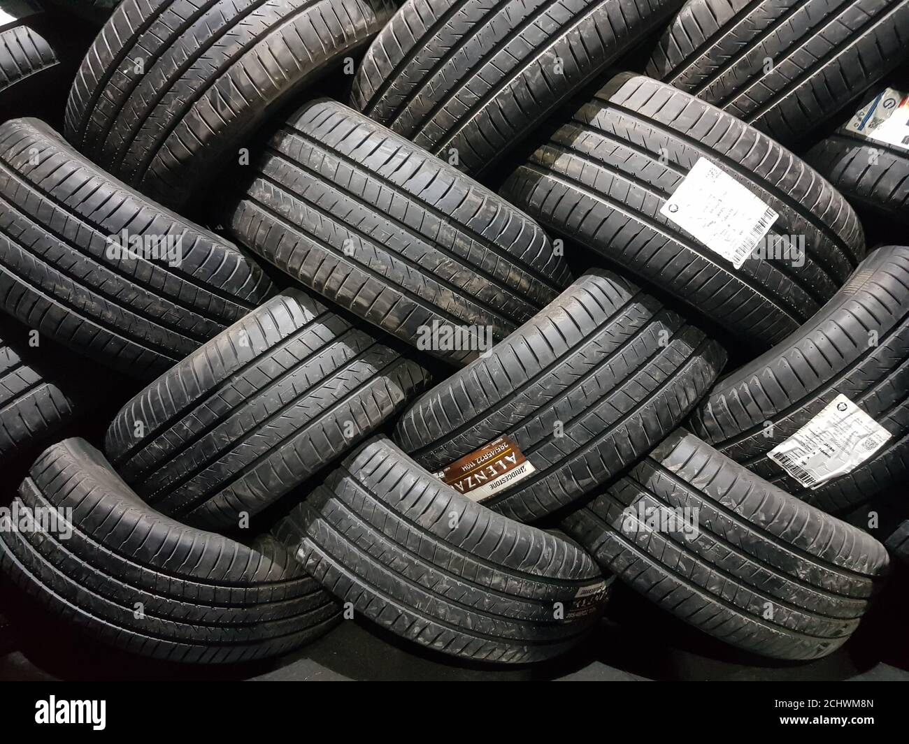 Car tyre warehouse Stock Photo - Alamy