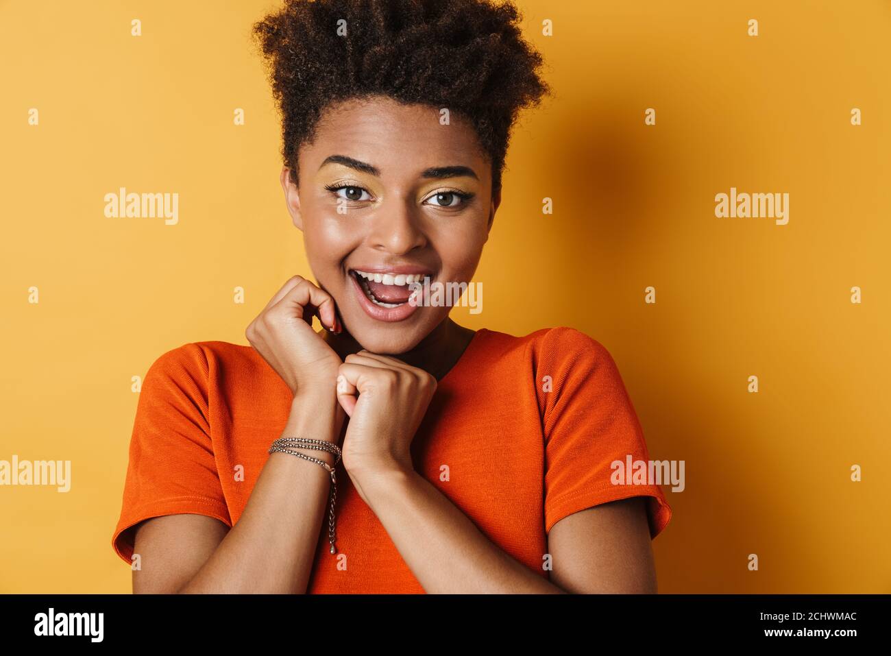 Image of excited african american woman expressing surprise on camera ...