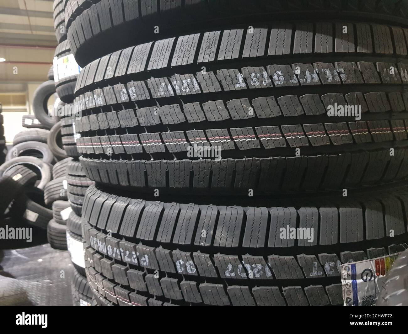 Car tyre warehouse Stock Photo - Alamy