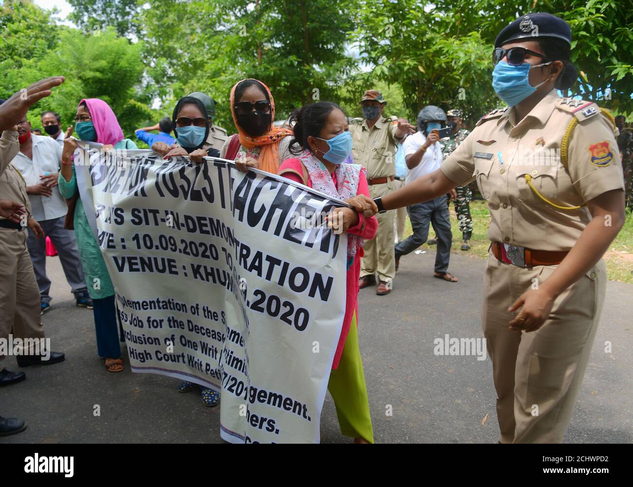 Terminated teachers at a protest rally themed Terminated teachers at a protest rally themed