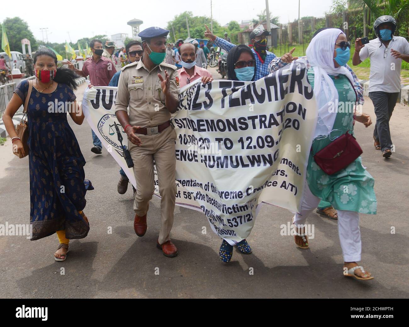 Terminated teachers at a protest rally themed Terminated teachers at a protest rally themed