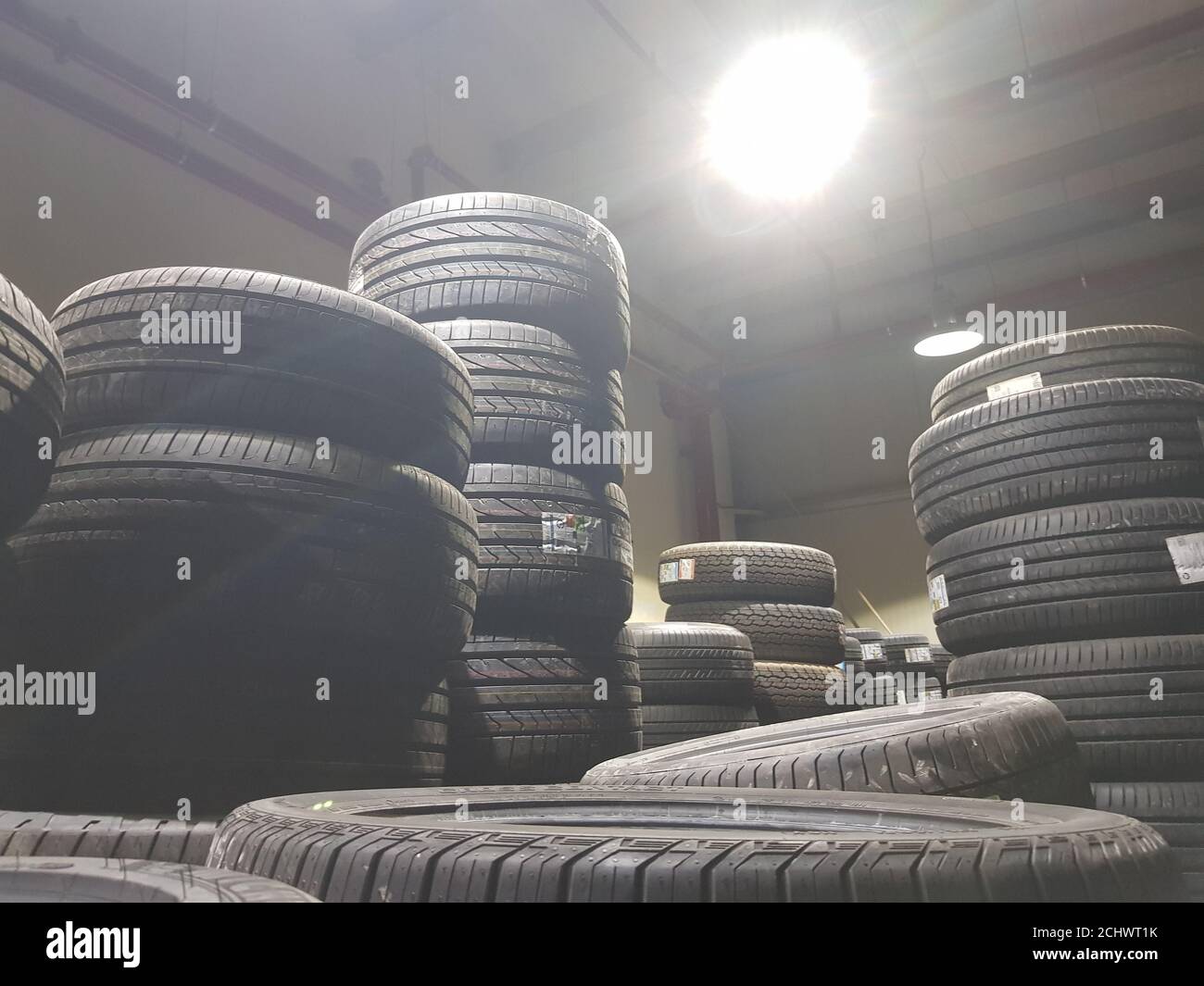 Car tyre warehouse Stock Photo - Alamy